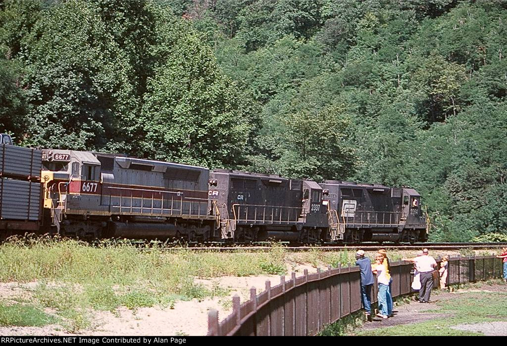 PC GP35 2364 leads sister unit 2337 and SDP45 6677